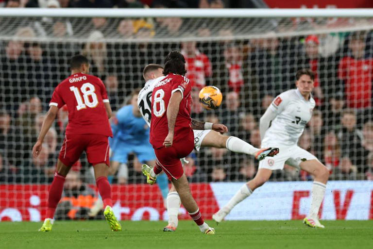 Soccer-Liverpool beat Barnsley 4-1 to reach FA Cup fourth round