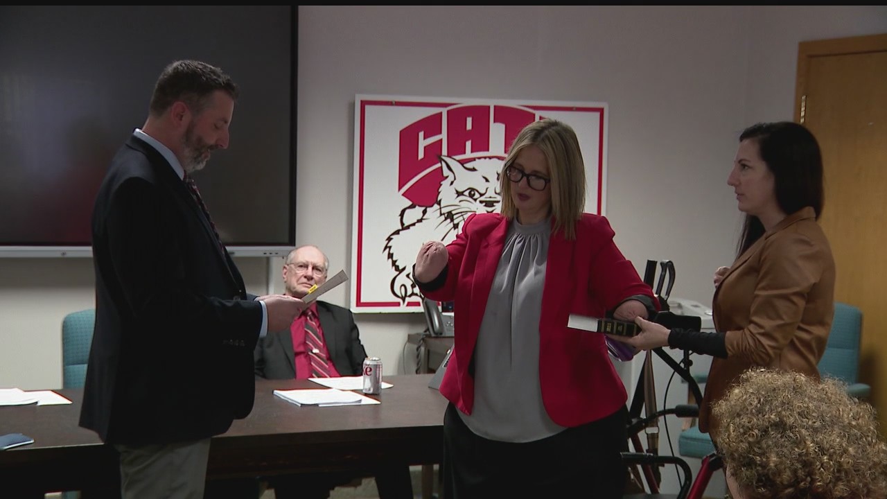 Woman who lost all 4 limbs sworn into school board, hopes story ...