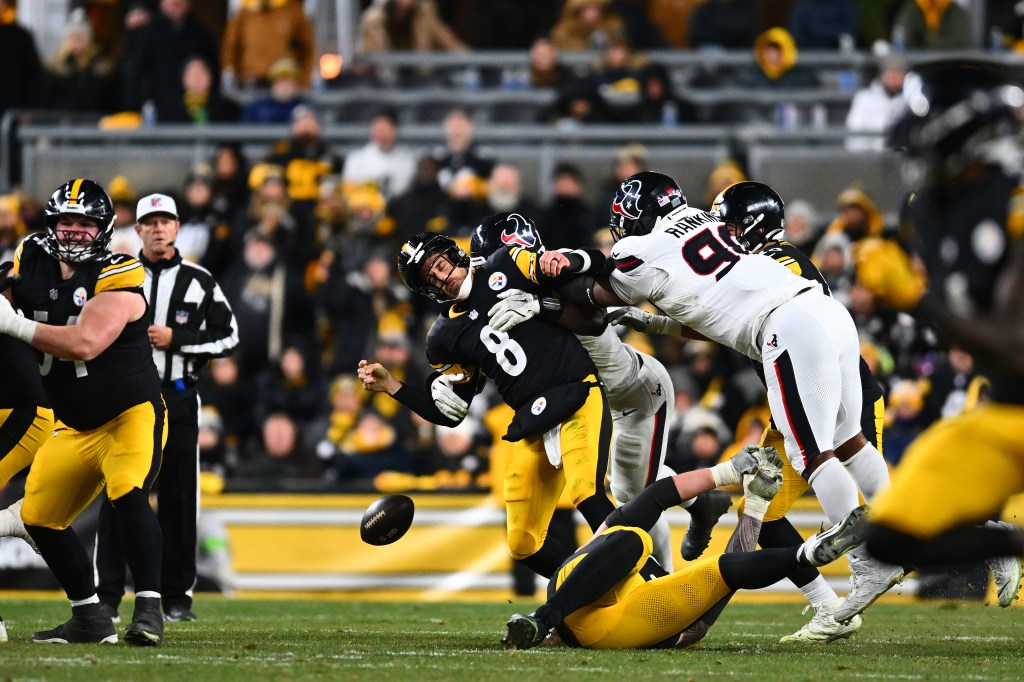 Aaron Rodgers battered by Texans in brutal playoff performance in ...