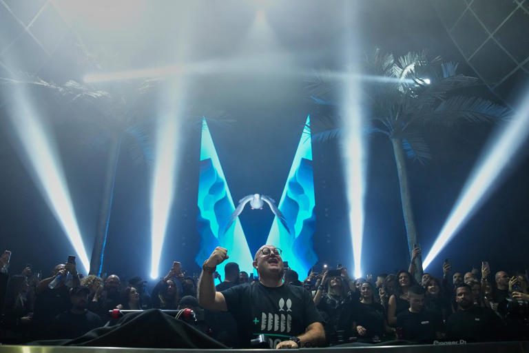 Priest by day, DJ by night: Padre Guilherme's rave in Beirut draws ...