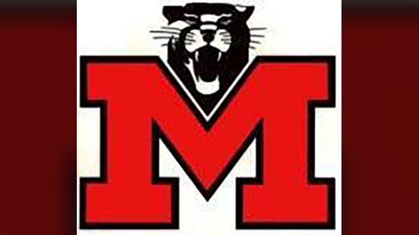 Monticello school bus rolls onto side, students on board