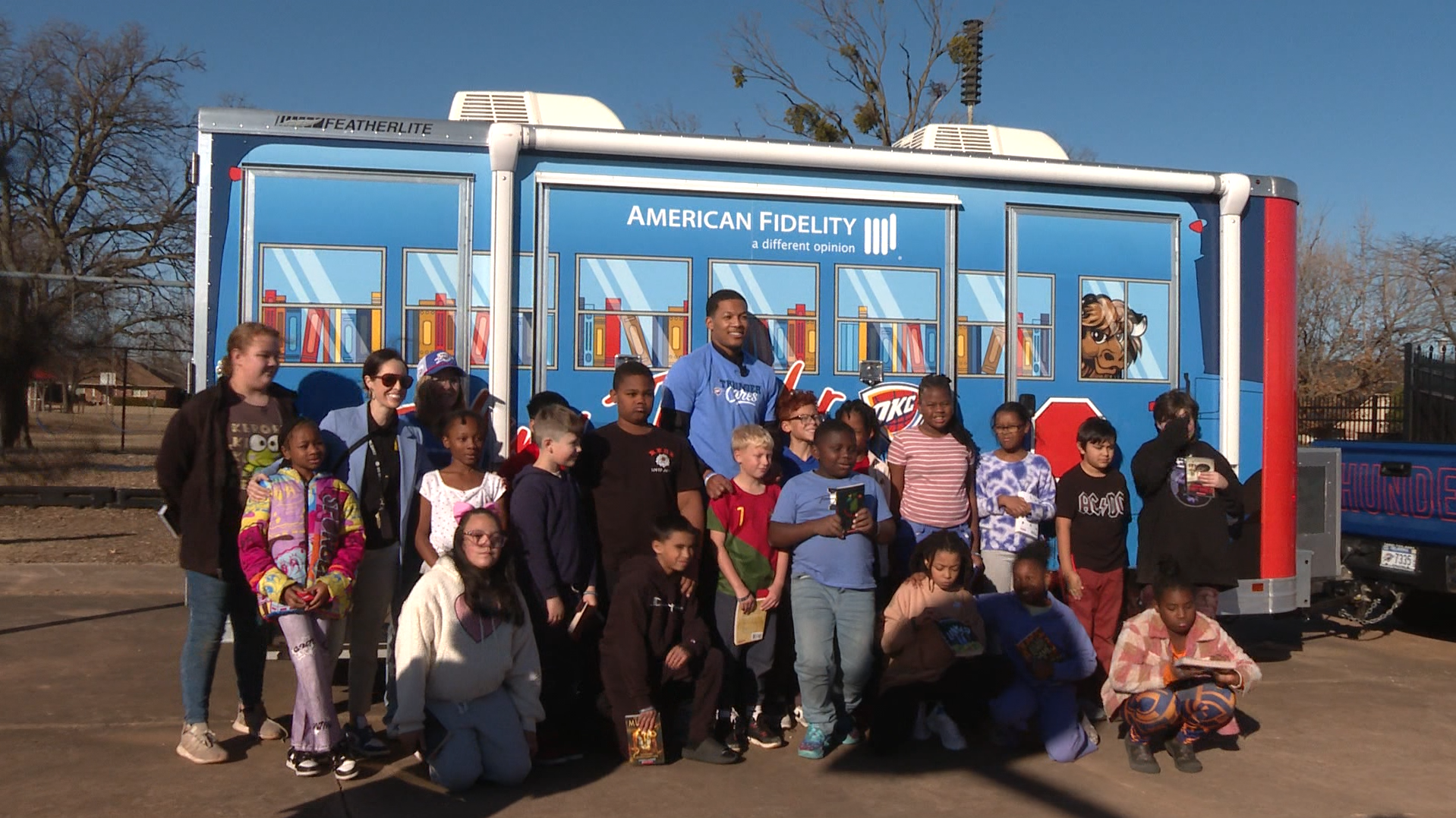 Oklahoma City Thunder's Rolling Thunder Book Bus visits elementary school