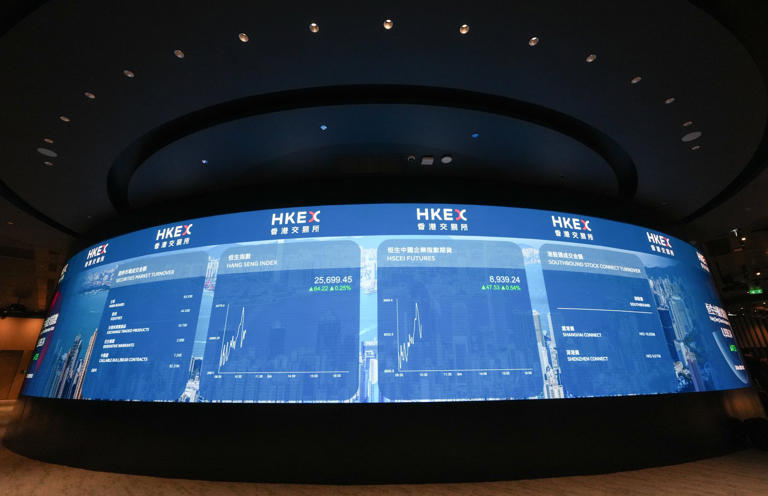 Chip designer GigaDevice surges 45% in Hong Kong debut amid China’s ...