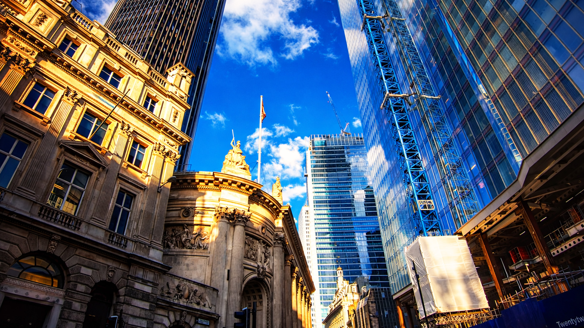 Walking past historic and modern buildings in London