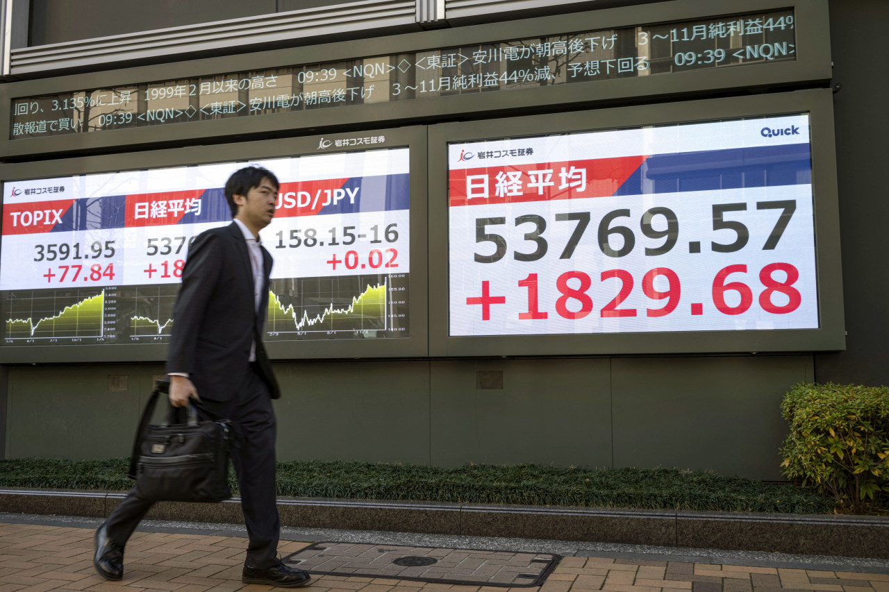 Japan’s Nikkei stock average hits record high on hopes for general election