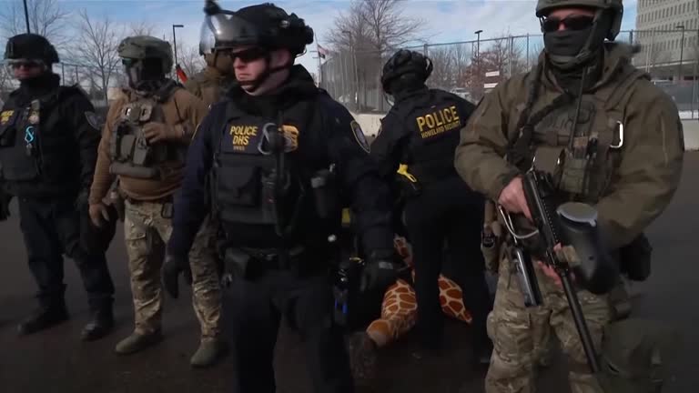 ICE agents arrest protest singer in tense Minneapolis standoff