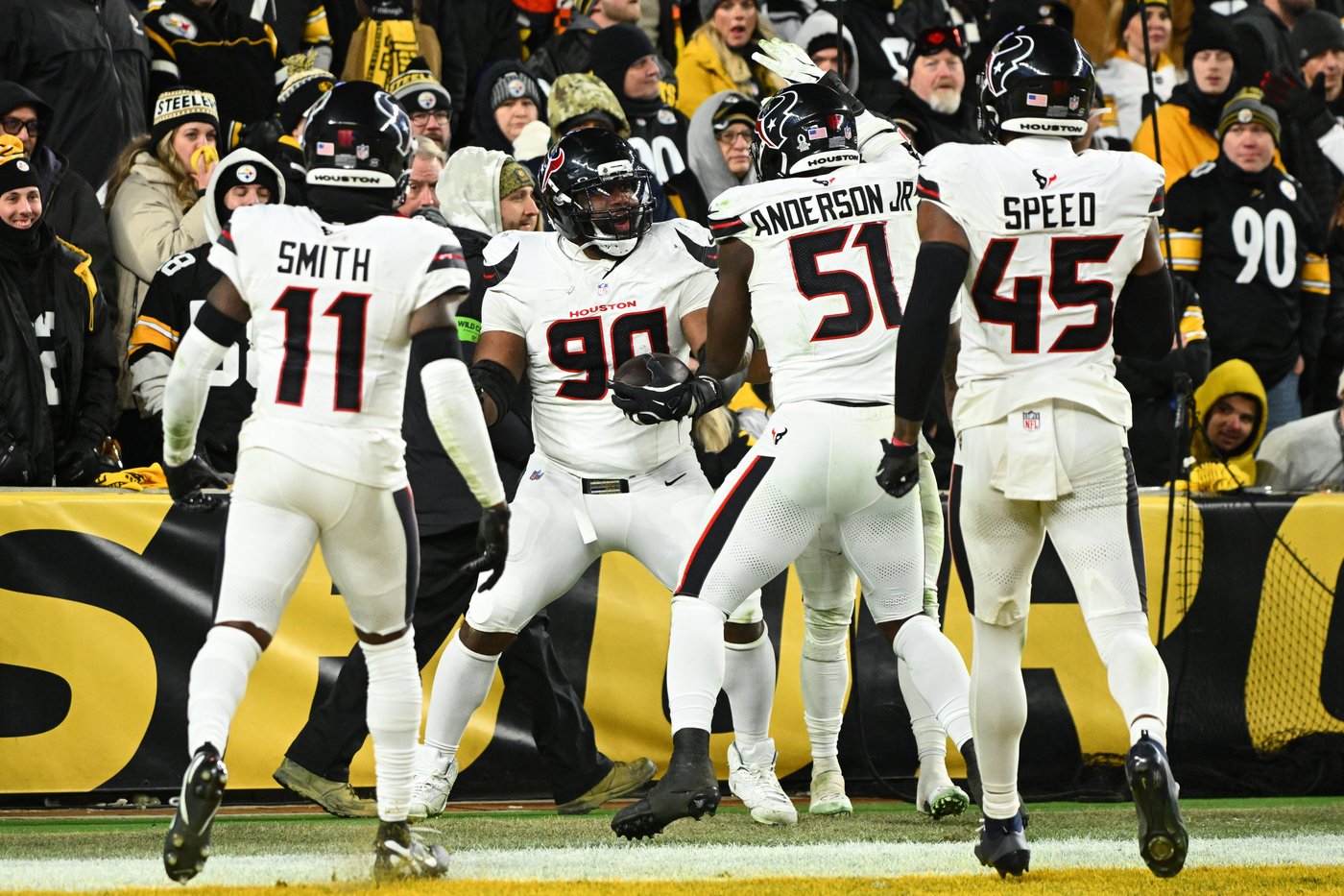 Texans secure first road playoff win with suffocating defensive performance