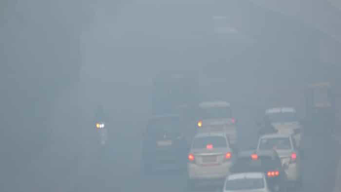 Cold wave, dense fog and severe pollution grip Delhi; Kashmir freezes