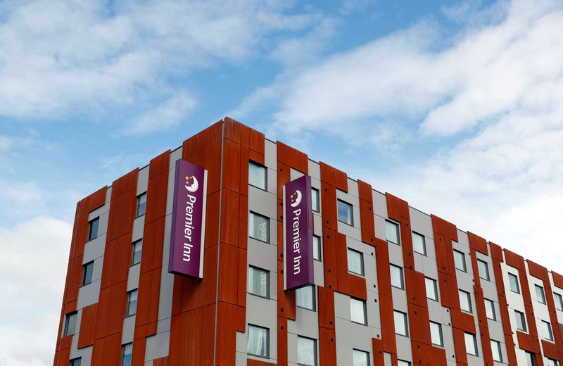 Premier Inn owner Whitbread's higher sales, lower tax hit lift shares