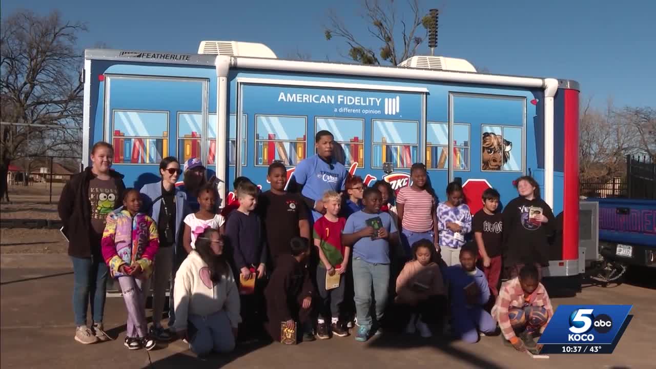 Oklahoma City Thunder's Rolling Thunder Book Bus visits elementary school