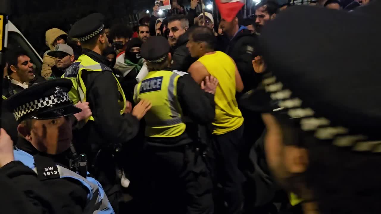 Police come face-to-face with protesters outside Iranian embassy