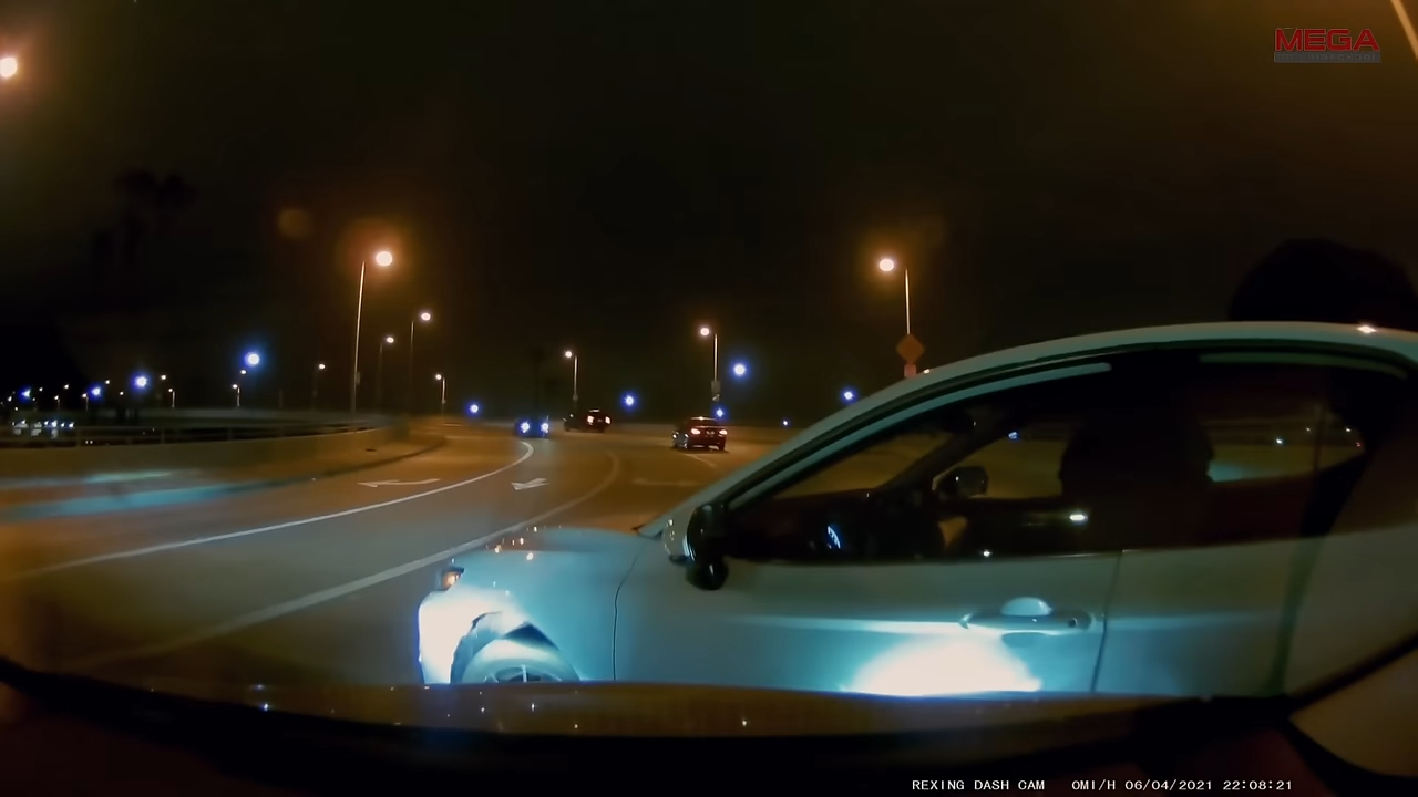 Driver attempts illegal U-turn in front of me