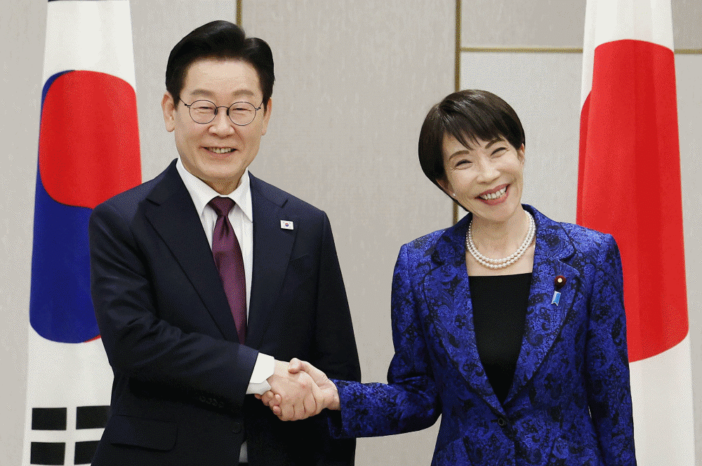 Lee and Takaichi play drum duet at summit