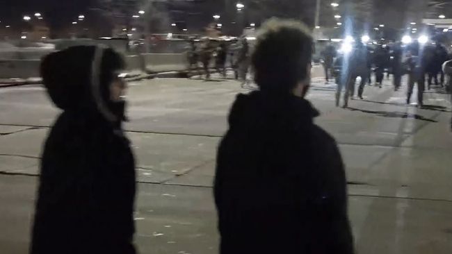 Camera operator hit by flash bang outside Minneapolis Federal Building