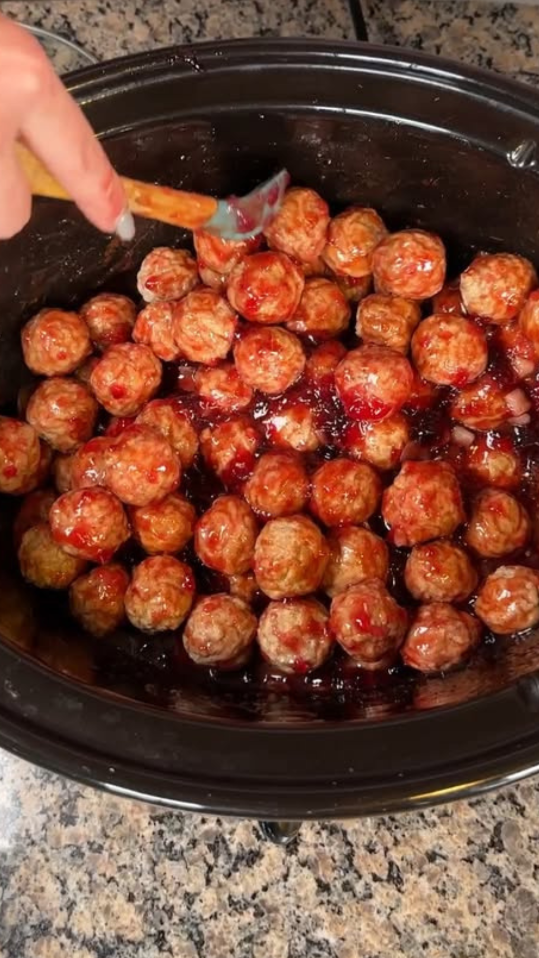 These crockpot grape jelly meatballs disappear fast