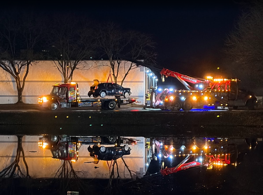 Man dead, 2 children rescued after vehicle found in water on northeast side