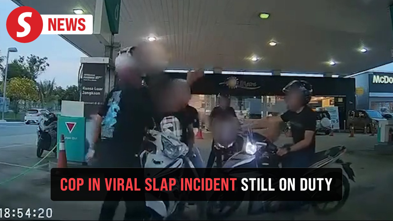 Cop in viral petrol station slap pulled from operations, still on ...