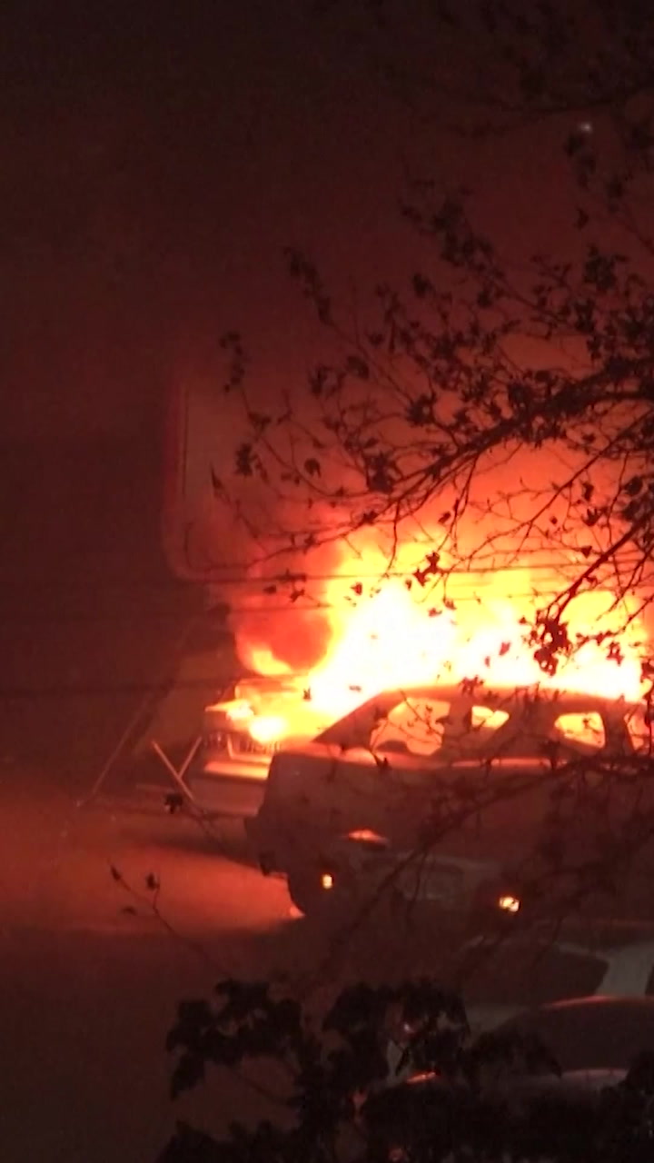 Cars set ablaze as anti-government protests rock Iran