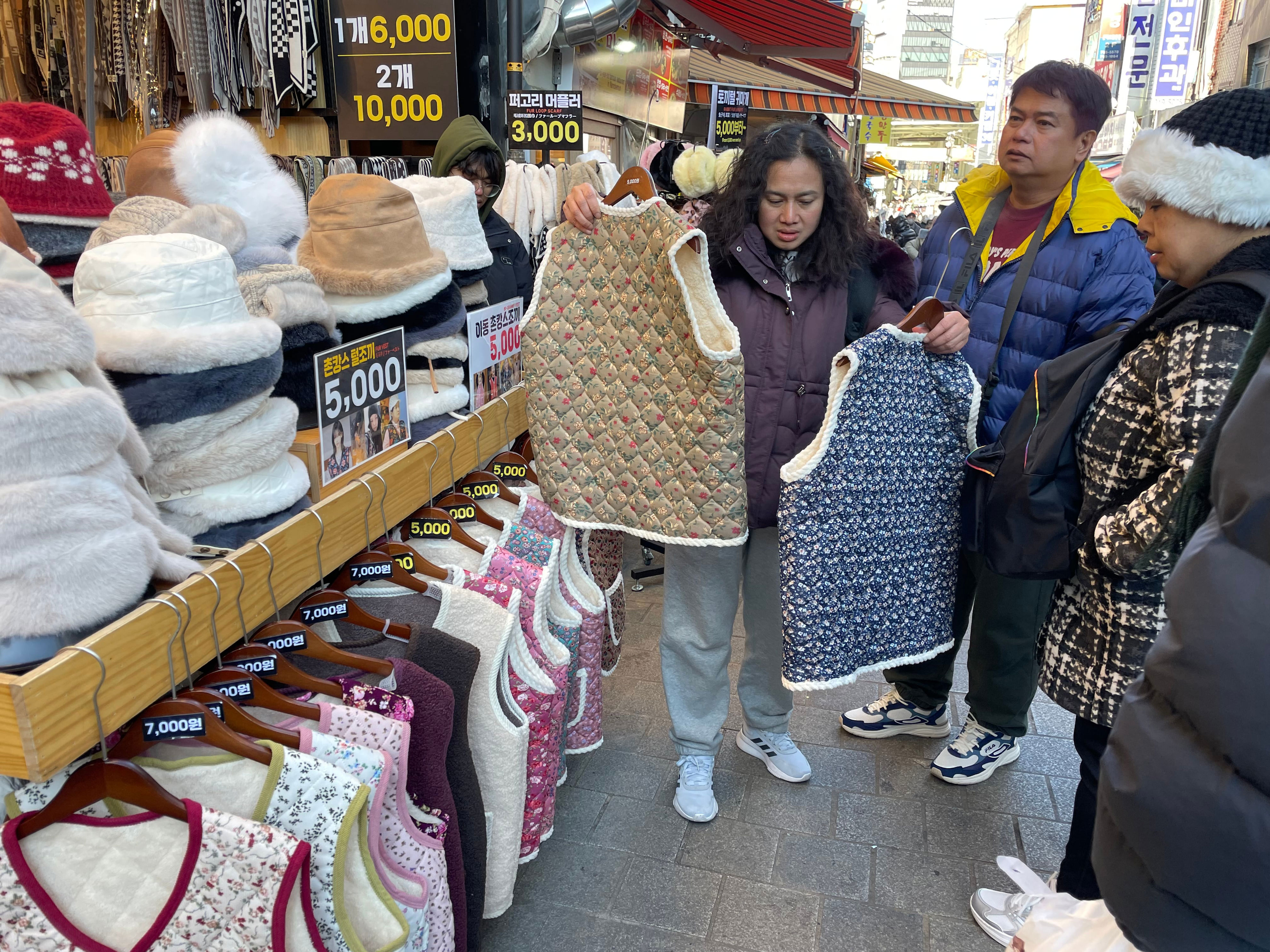 K-Granny vests and K-School uniforms lure foreign tourists