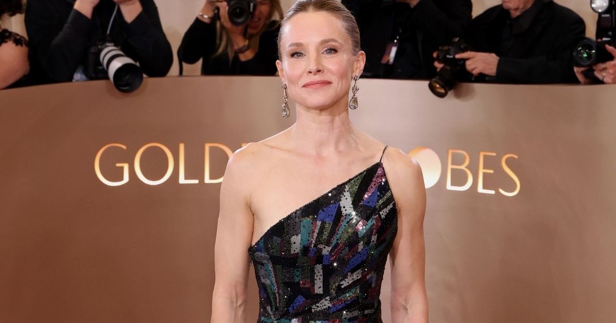 Kristen Bell's Armani Prive dress hangs on by a single string