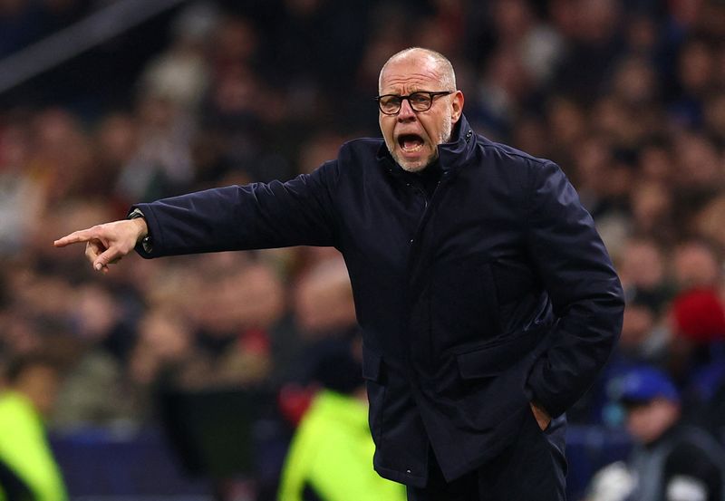 Soccer-Ajax to stick with interim coach Grim for rest of season