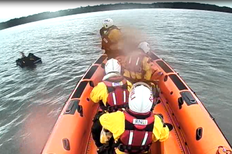 Person rescued after trying to sail to island on inflatable mattress