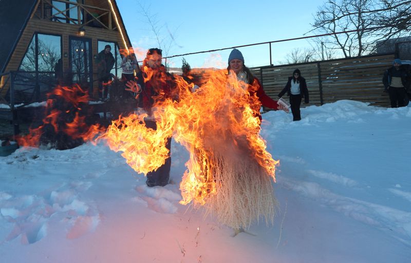 Georgians set decorative tree ablaze to usher in hope for new year