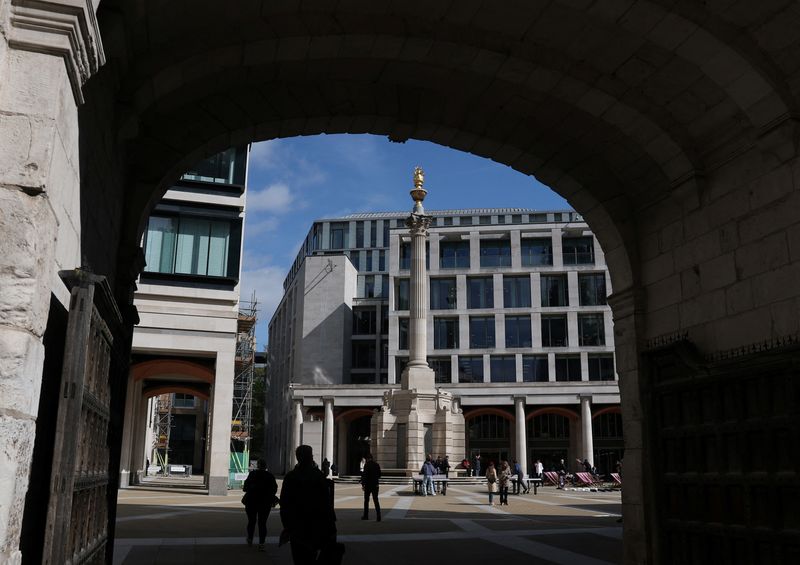 UK's FTSE 100 ends flat amid mixed corporate updates, US inflation data