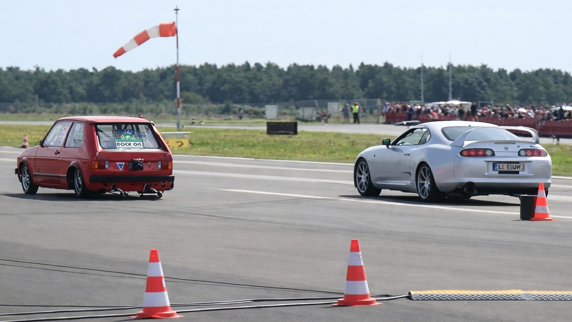 VW Golf 1 and Toyota Supra Turbo race head on