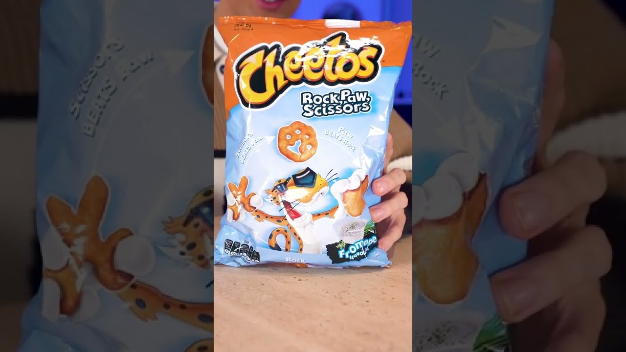 Playing edible rock paper scissors with Cheetos