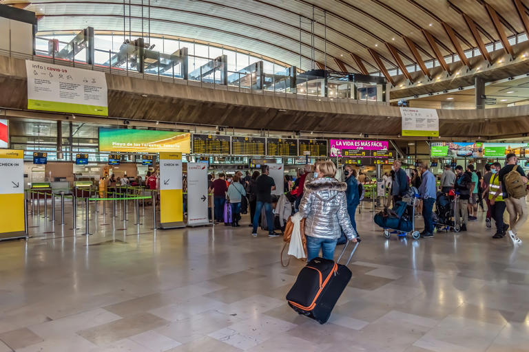 Man caught pushing dead wife through airport security