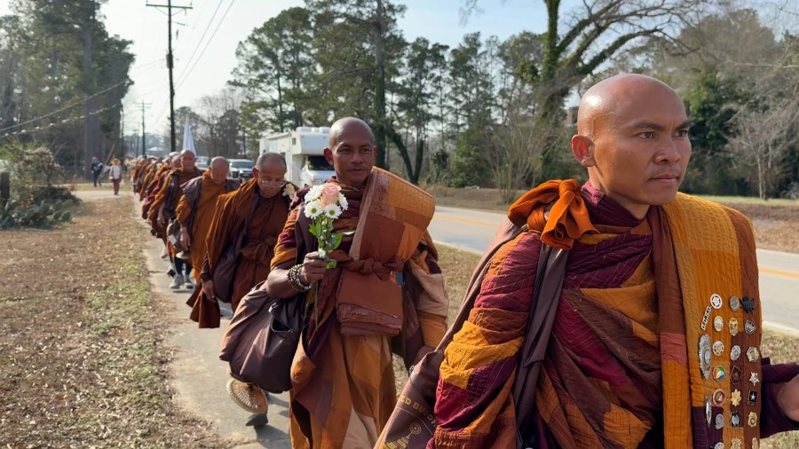 Monks continue their walk for peace in the Carolinas