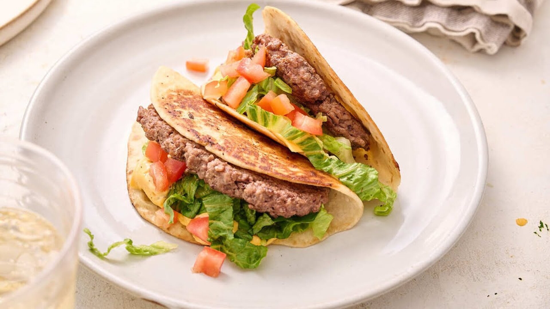 Cheesy smash burger tacos recipe