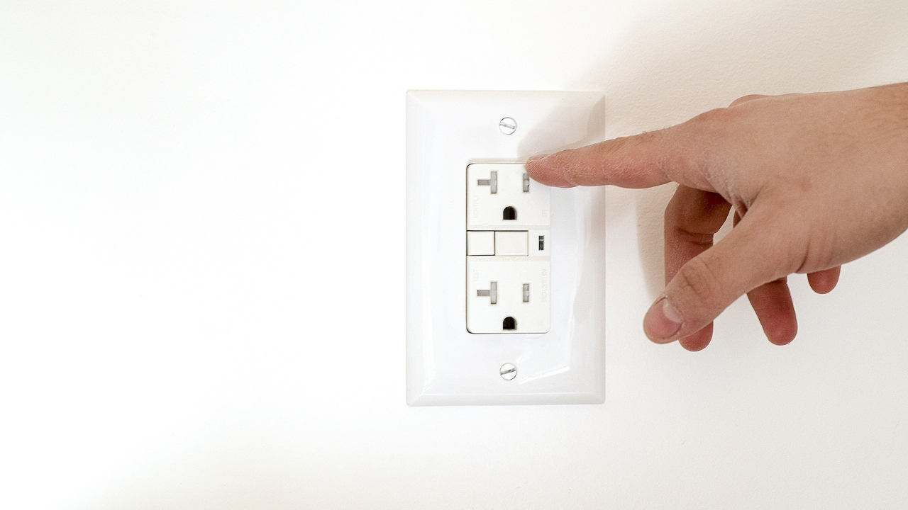 If your outlet plate feels warm, here’s what that usually means in winter