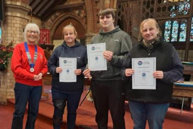 Three members of family achieve bell ringing award