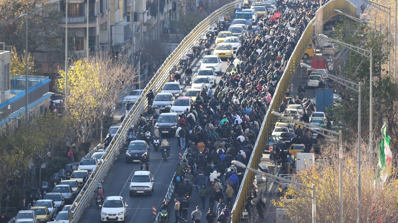 Iran restores communications as deadly protests continue
