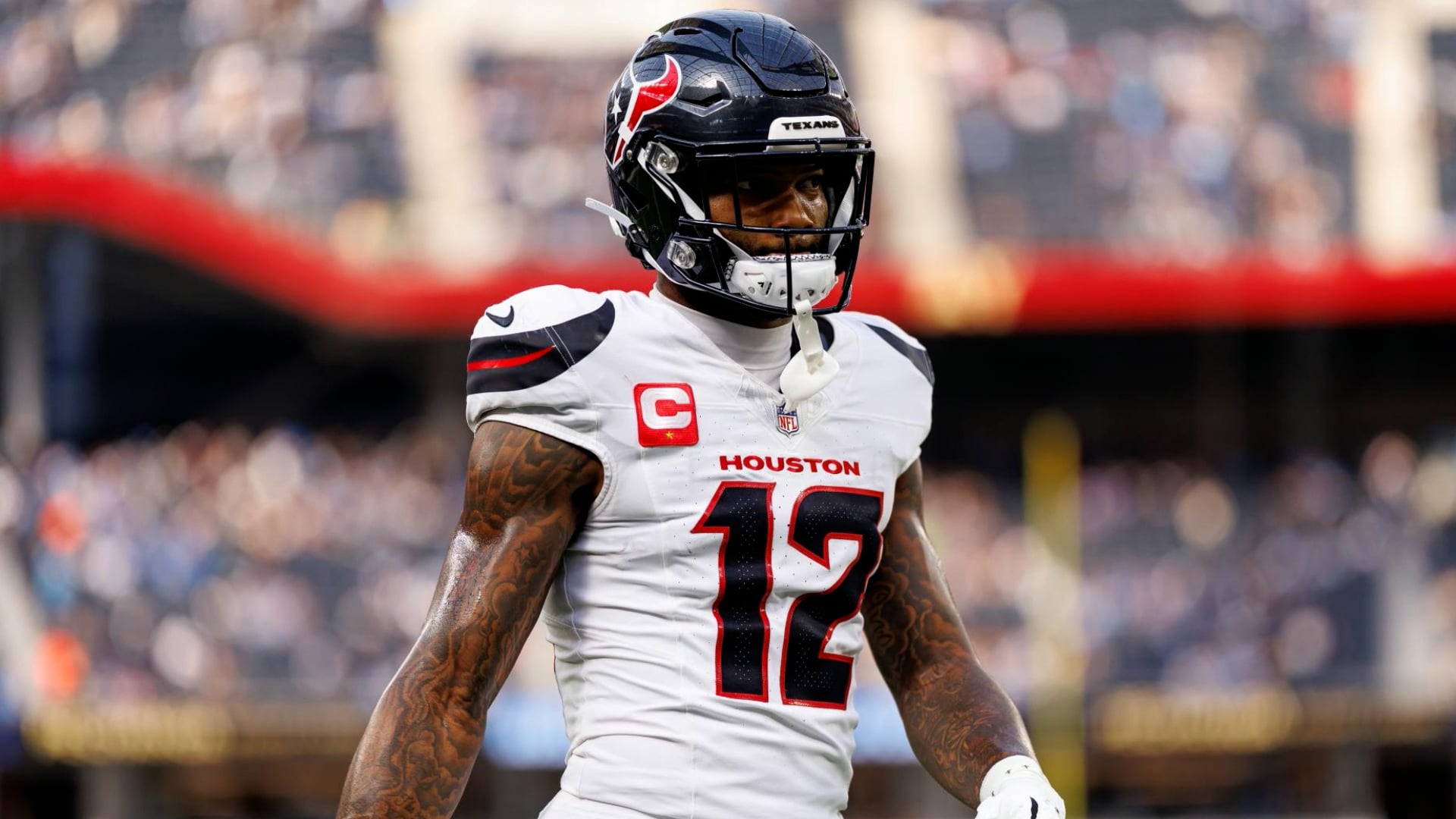 Texans WR Collins exits playoff win with concussion