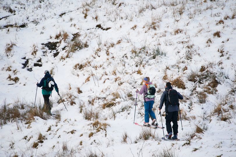 Man climbs Pen Y Fan after Storm Goretti and conditions are wild