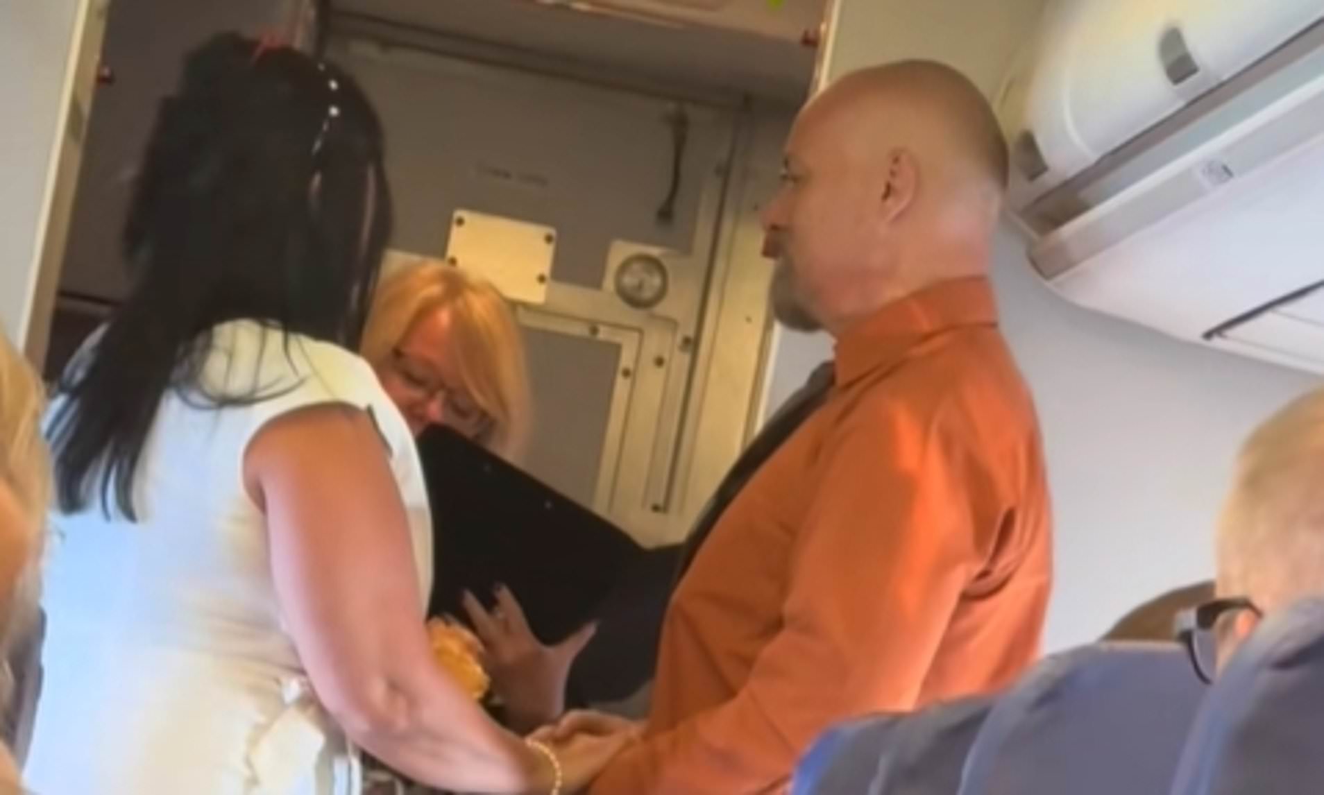 Couple get married on a flight - and stop fellow passengers from ...