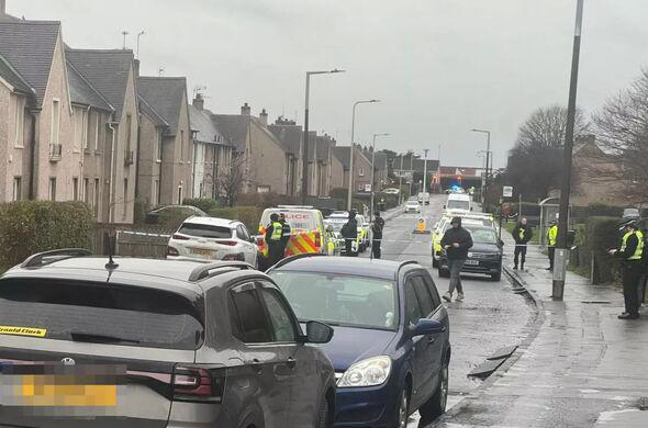 Armed police swoop on residential street in UK city as man seen ...