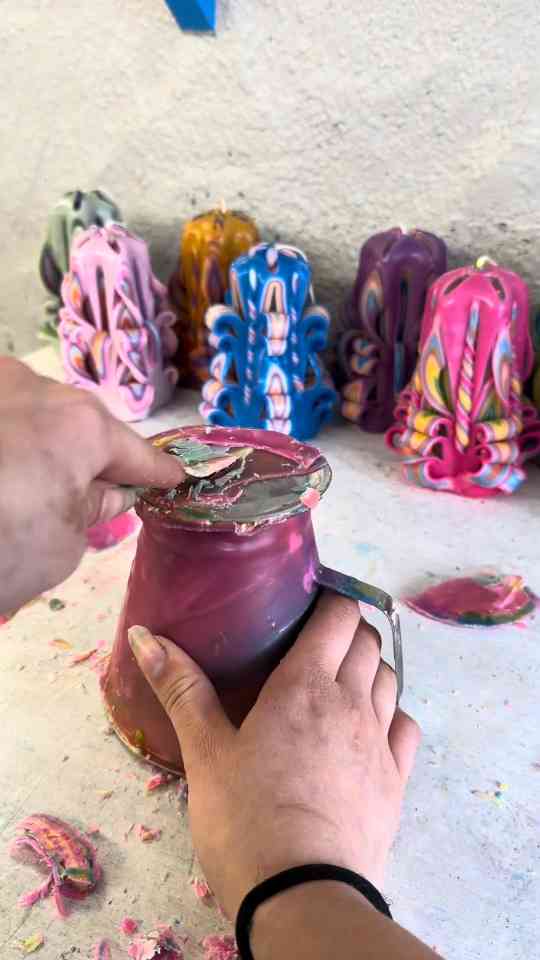 Scraping wax off a messy jug