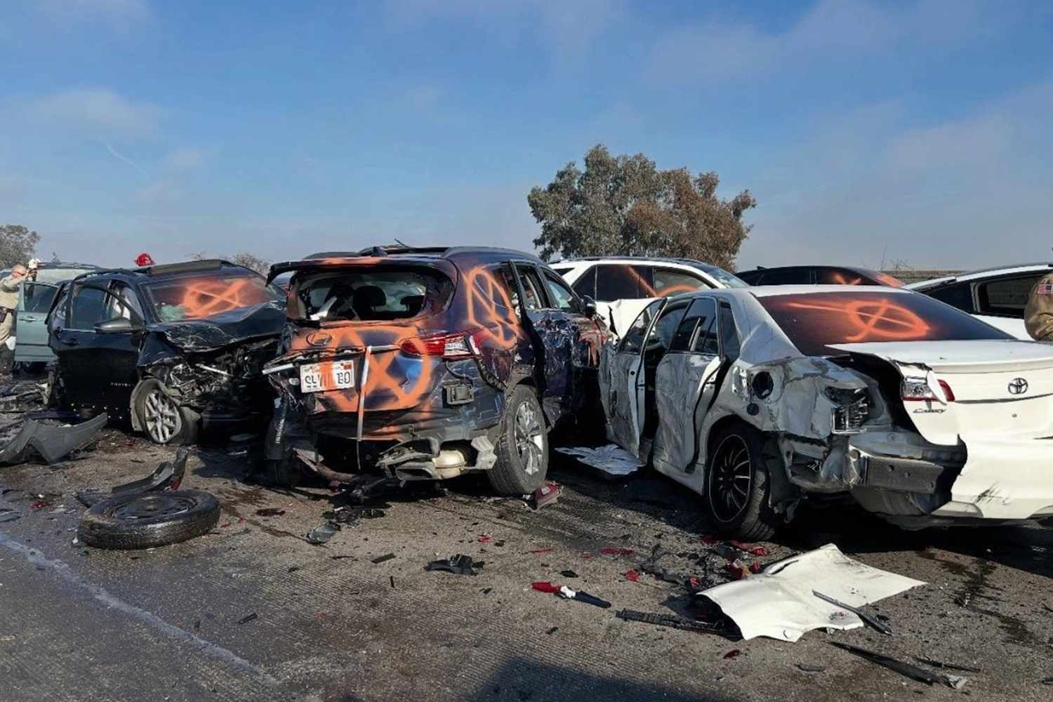 1 dead and at least 20 others injured in multi-vehicle pile up on ...