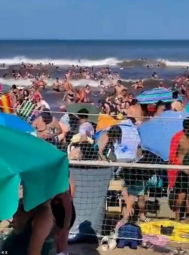 Freak 'meteotsunami' engulfs beach leaving one dead and dozens injured ...