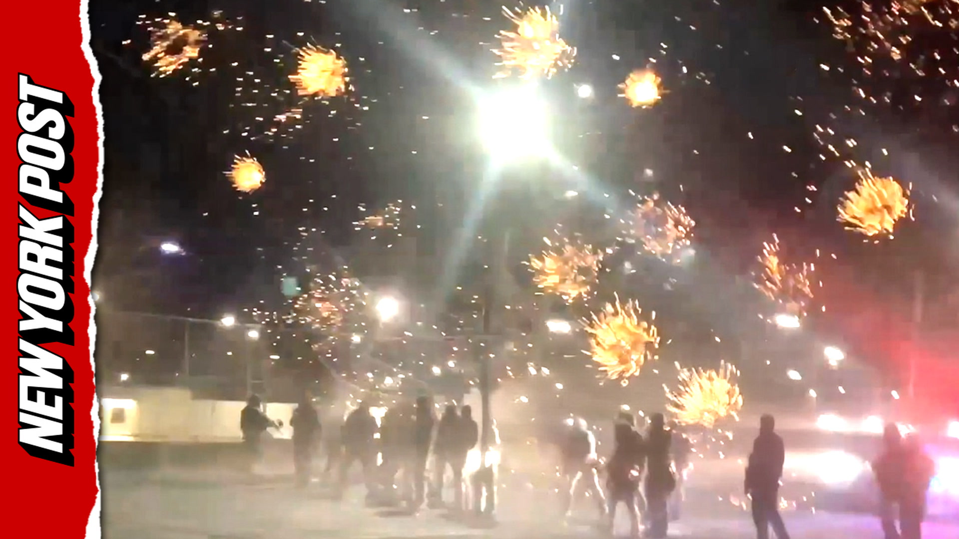 Fireworks and teargas as anti-ICE protesters clash with police outside ...