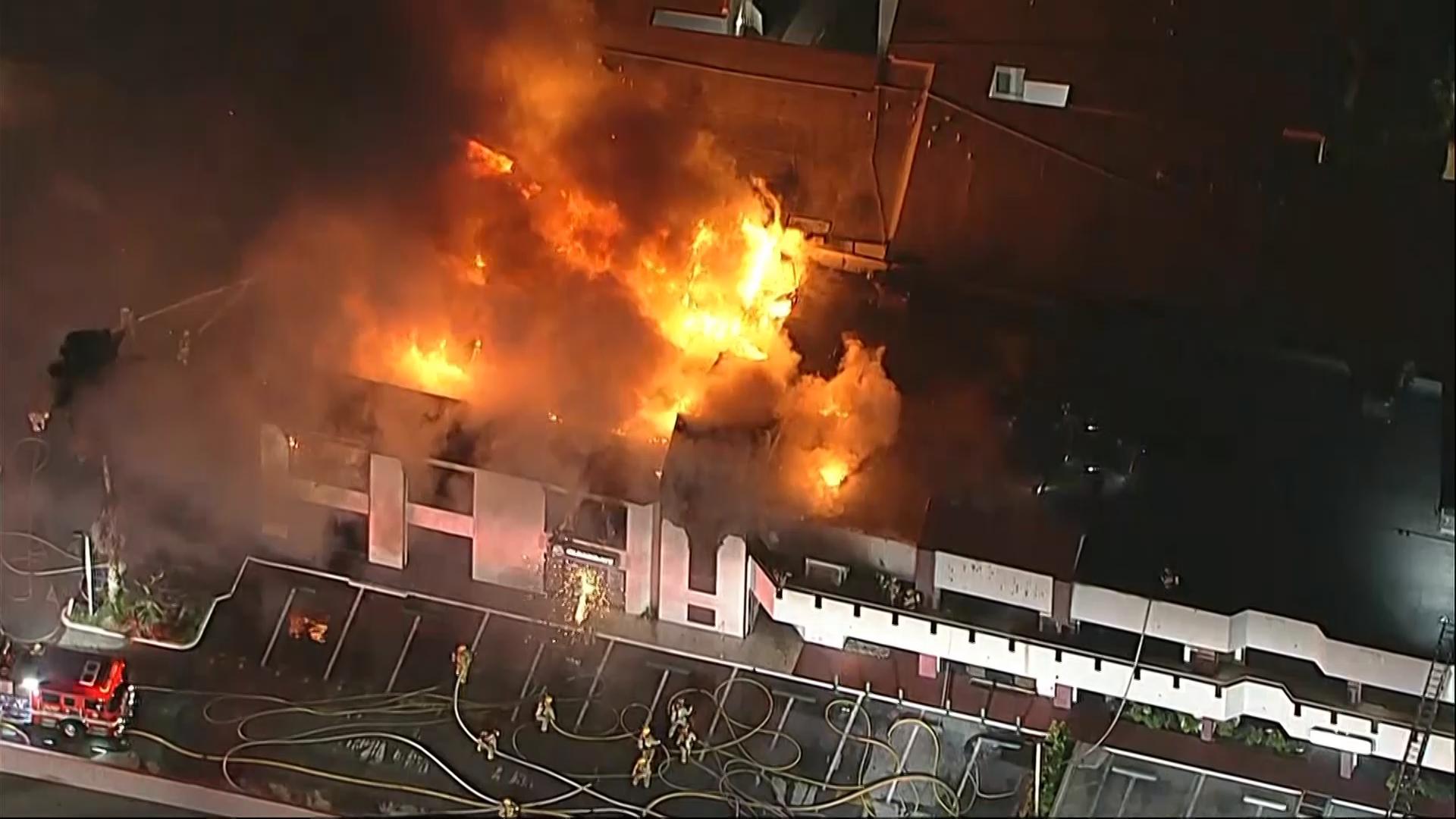 Large building fire in Los Angeles send flames high into the air