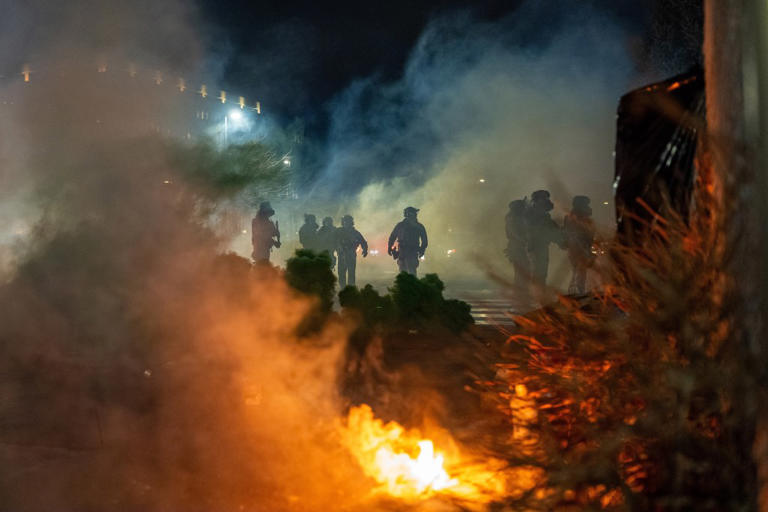 Chaotic video shows anti-ICE agitators blast fireworks at law ...