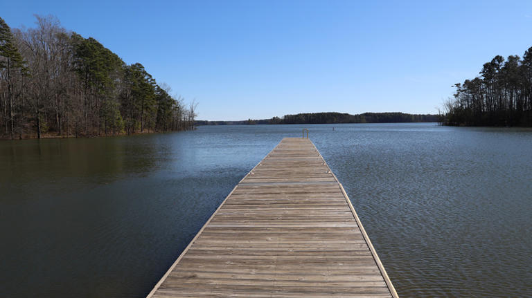 Straddling Virginia and North Carolina's border is an expansive lake to ...