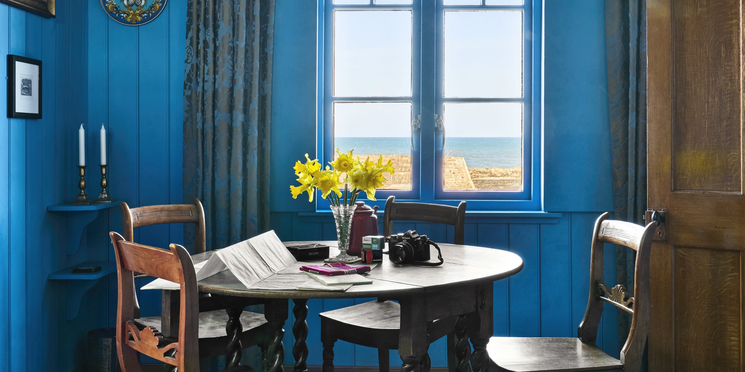 Inside a blue cabin 'on the edge of the world' – reached only by a rock ...