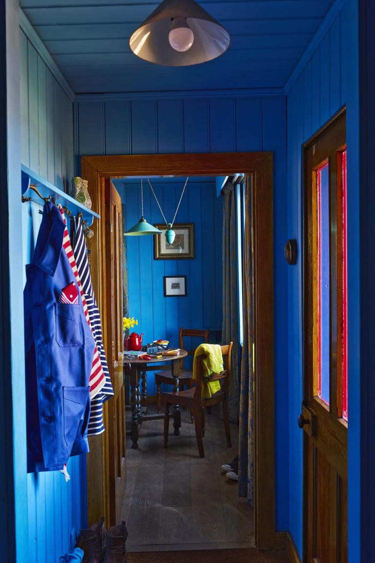Inside a blue cabin 'on the edge of the world' – reached only by a rock ...
