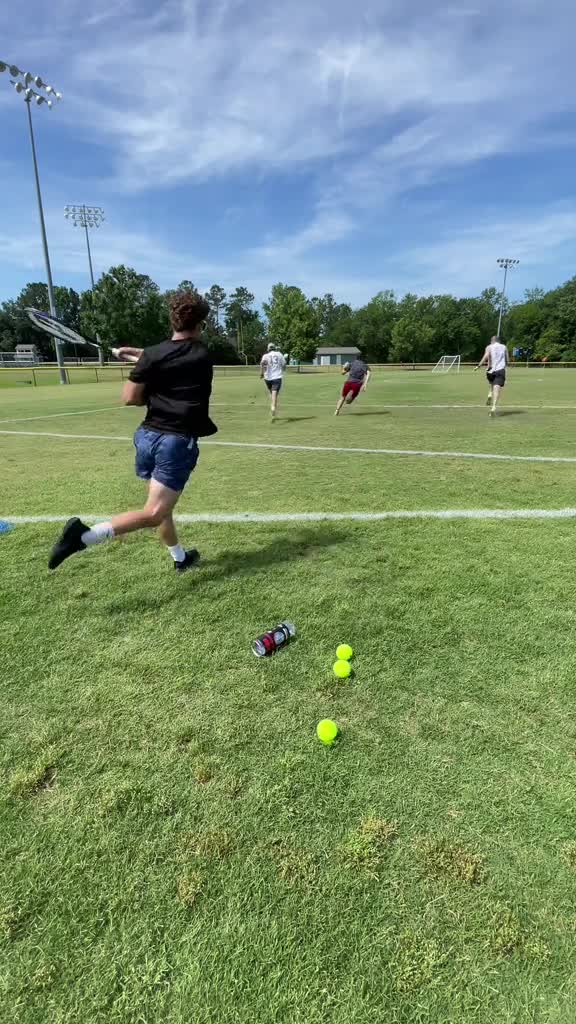 Spin the bottle tennis chase on the field